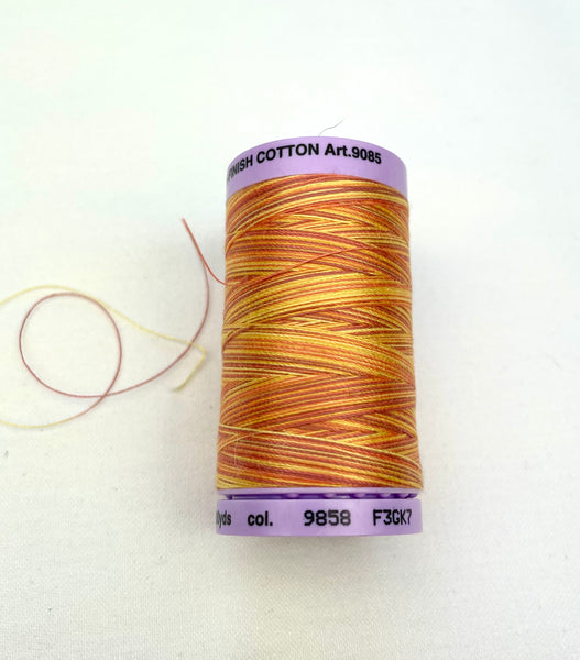 Large Burnt Orange Variegated Mettler Thread 9858- 457m – Abigail Mill